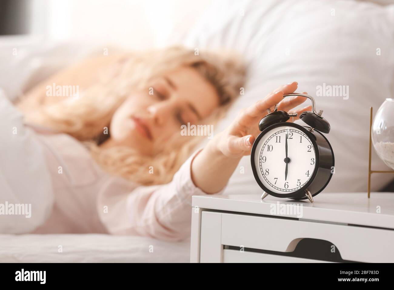 Switching off alarm clock hi-res stock photography and images - Alamy