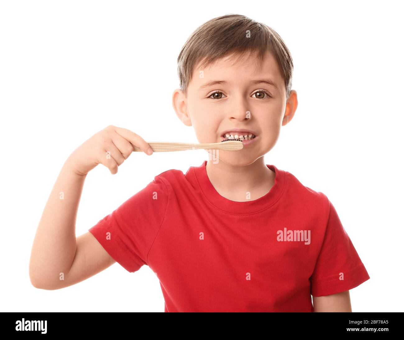Cute little boy with tooth brush on white background Stock Photo - Alamy