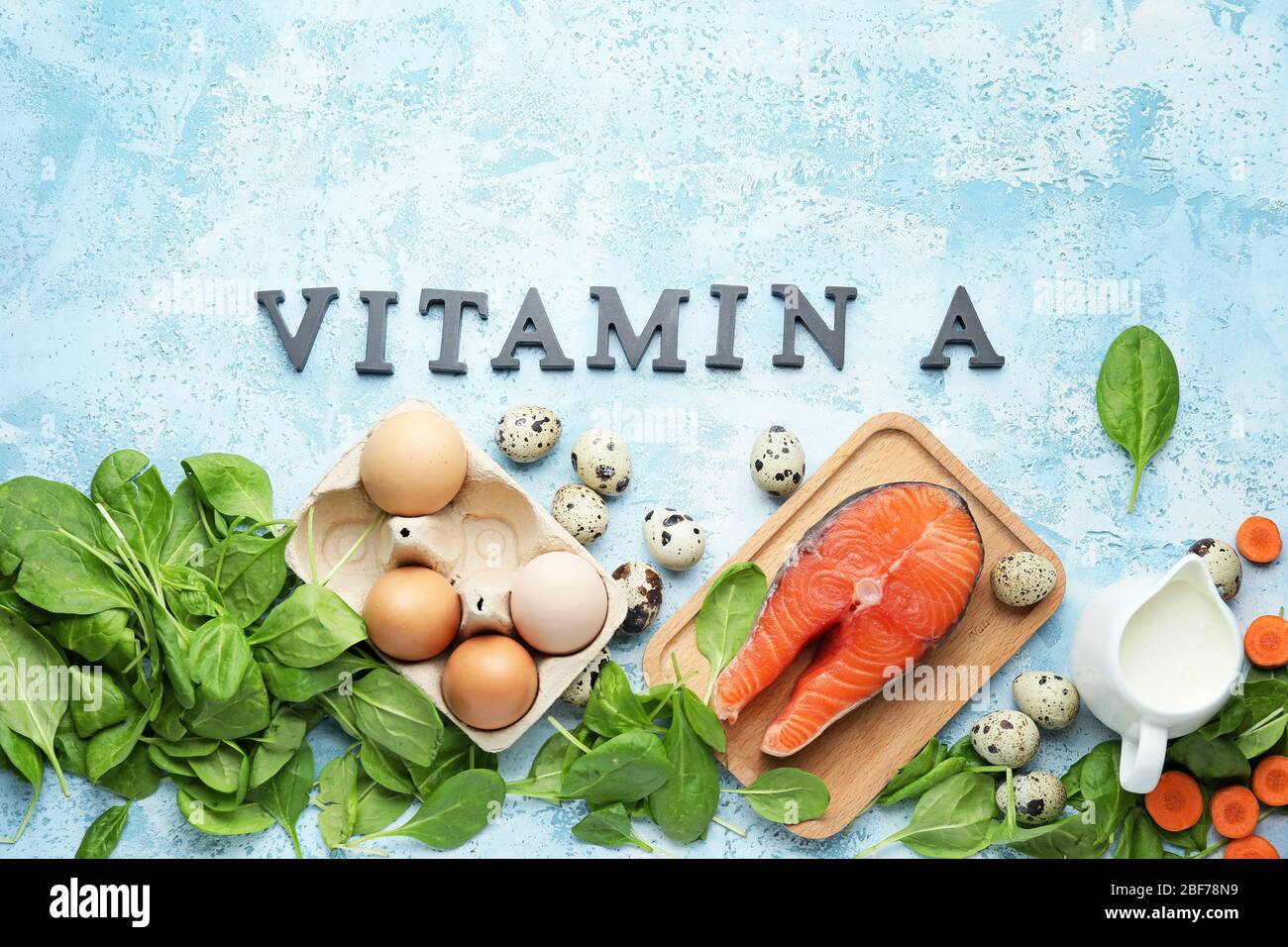 Healthy products rich in vitamin A on color background Stock Photo - Alamy