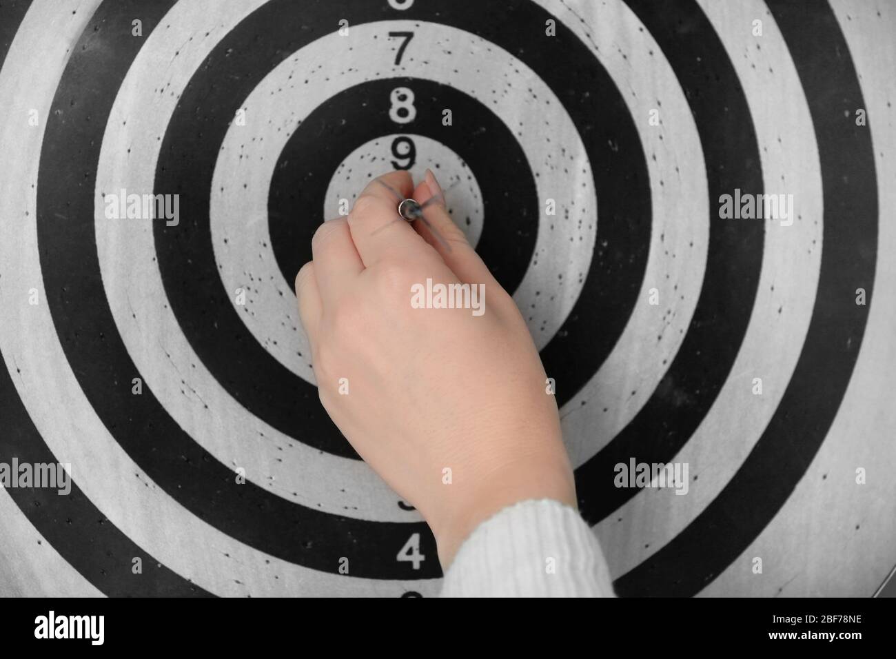 Young woman playing darts indoors, closeup Stock Photo - Alamy