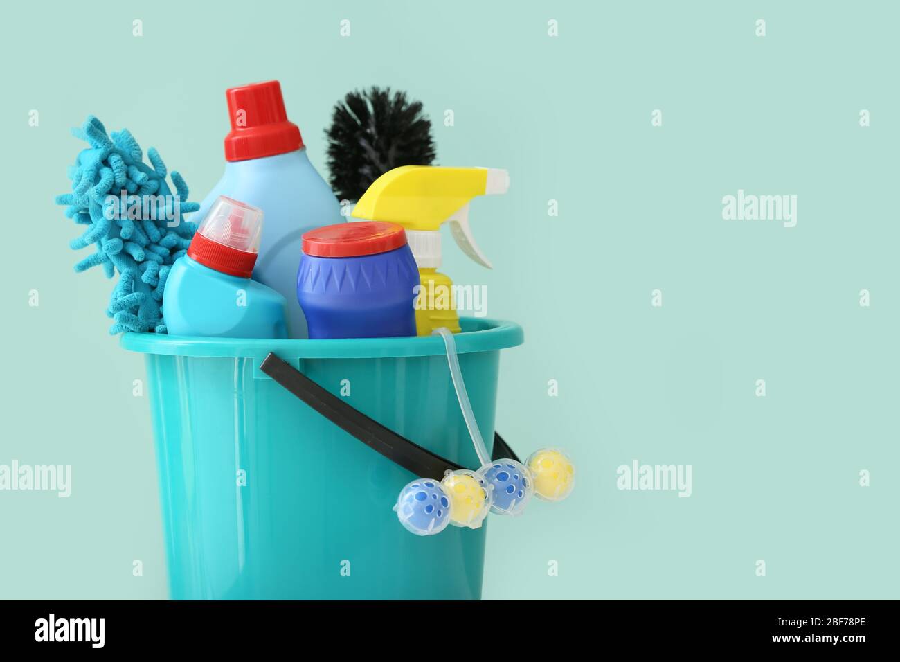 Set of cleaning supplies on color background Stock Photo - Alamy
