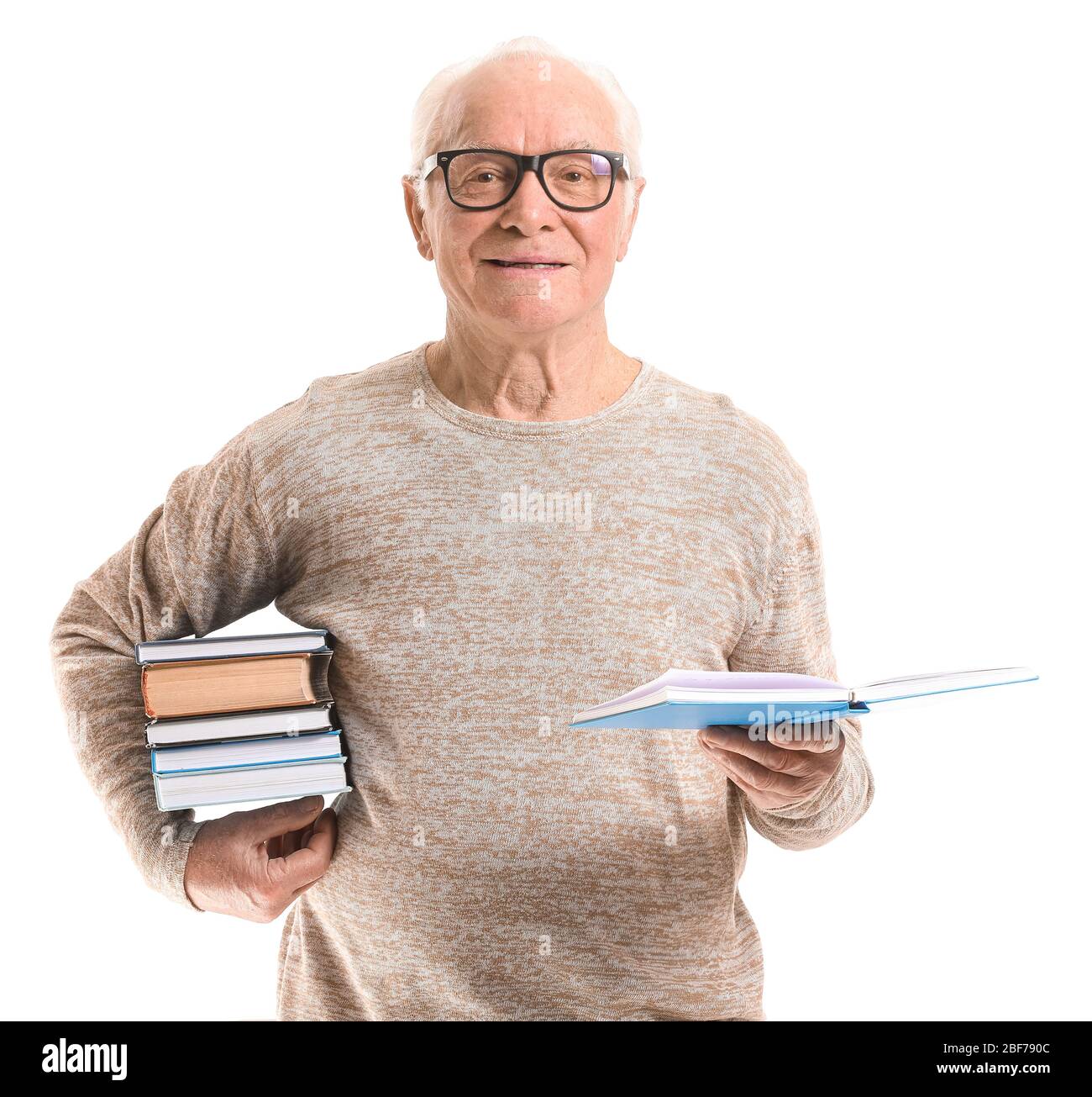 Man white shirt reading stack of books hi-res stock photography and ...