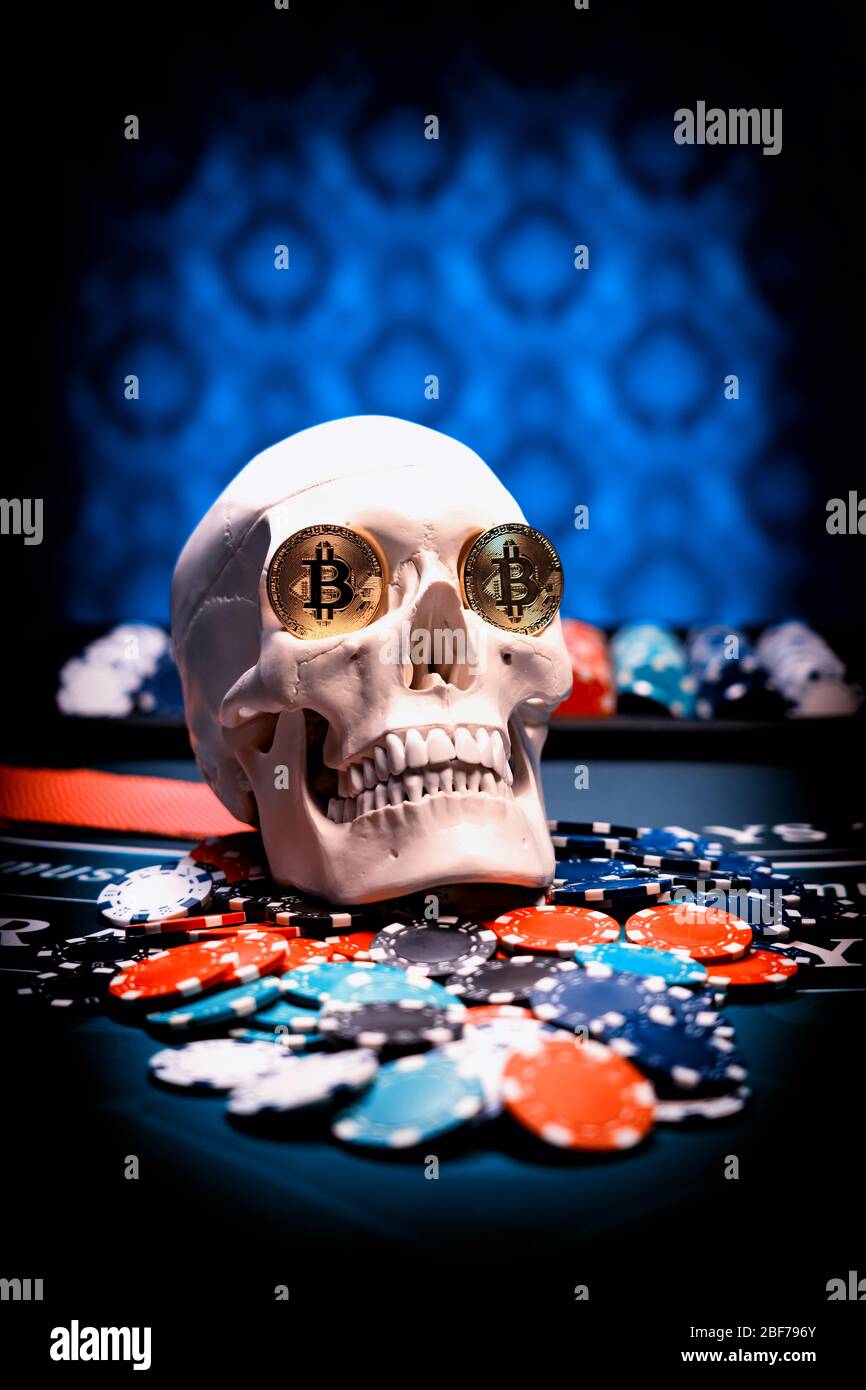 Bitcoin Human skull at Black Jack table Stock Photo - Alamy