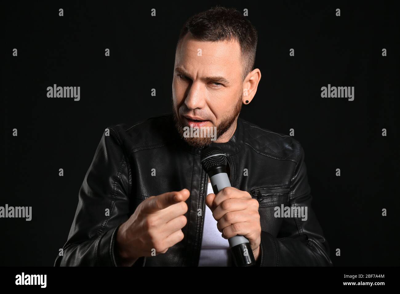 Black business man singing microphone hi-res stock photography and ...
