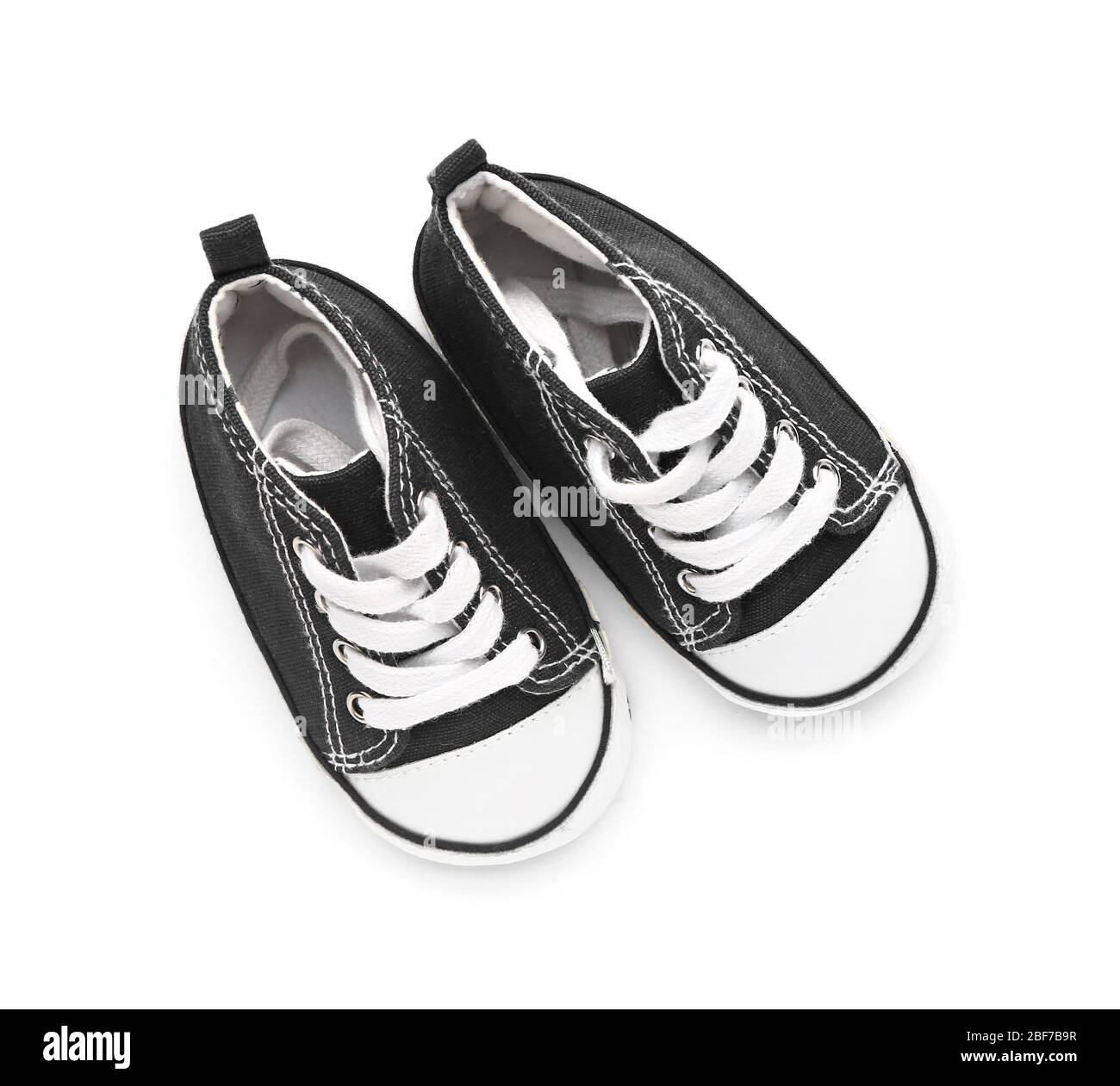Baby booties on white background Stock Photo - Alamy