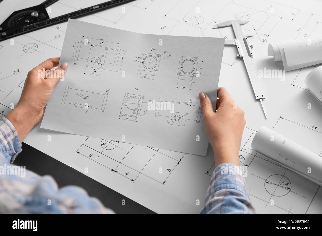 Female engineer drawings in office hi-res stock photography and images ...