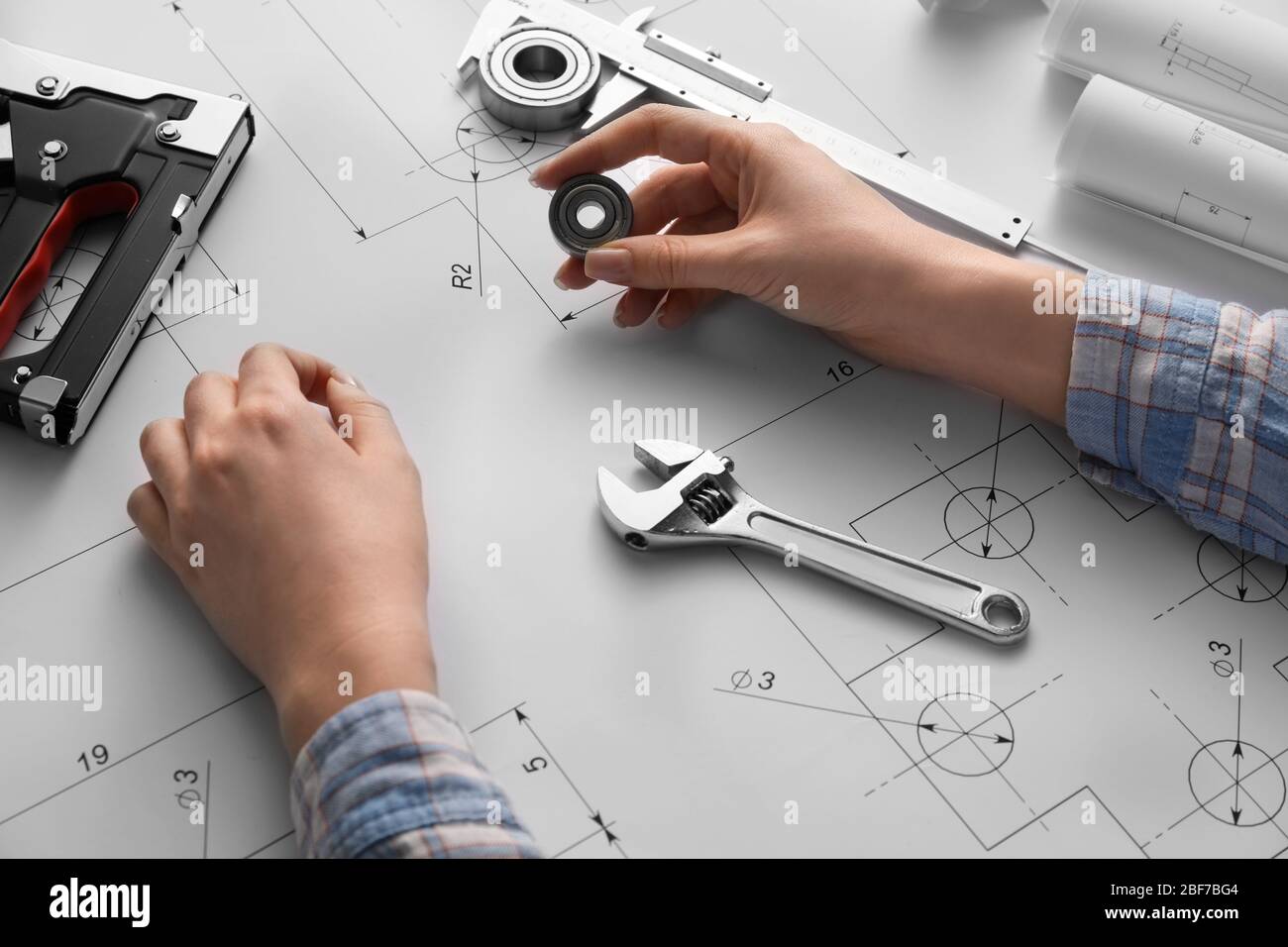 Female engineer drawings in office hi-res stock photography and images ...