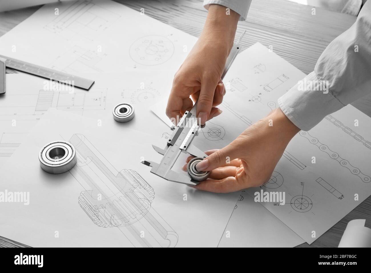 Female engineer working in office Stock Photo - Alamy