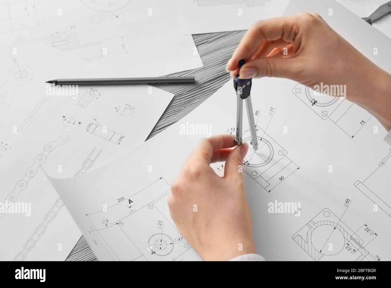 Female engineer drawings in office hi-res stock photography and images ...