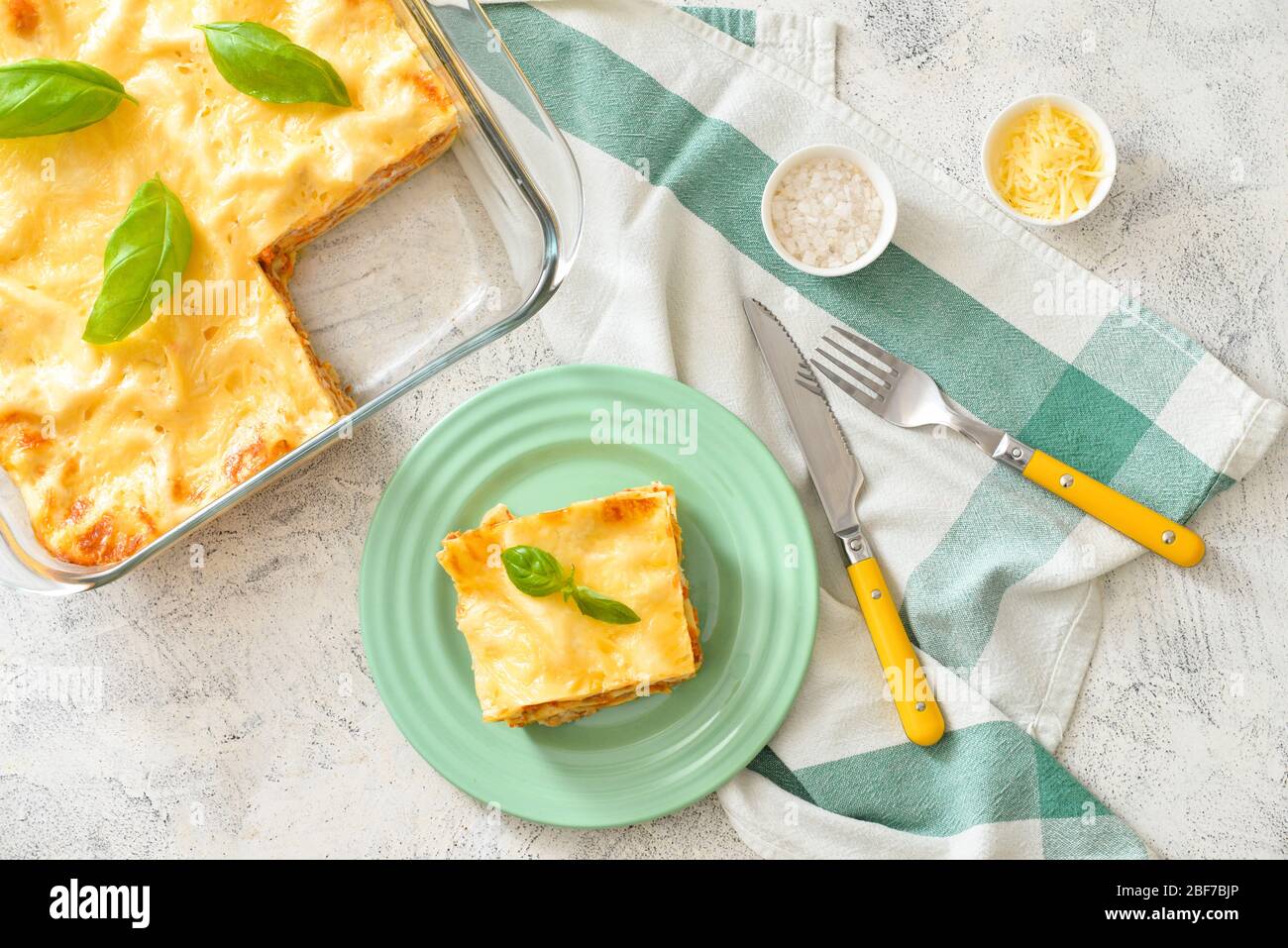 Composition with tasty homemade lasagna on table Stock Photo - Alamy
