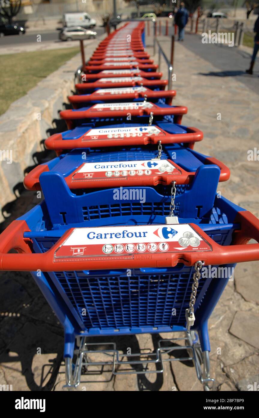 chained shopping carts Stock Photo - Alamy