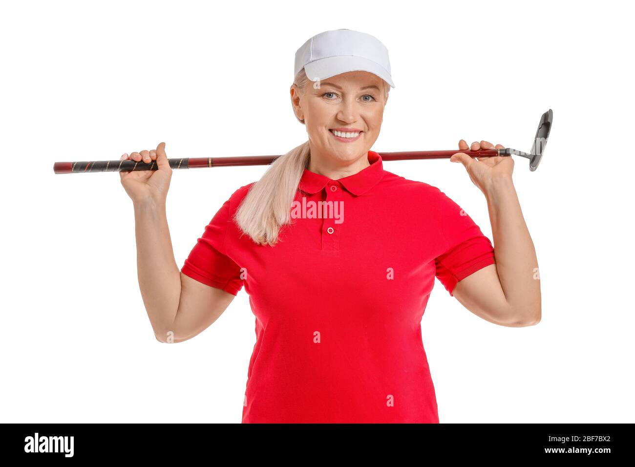 Mature female golf player on white background Stock Photo - Alamy
