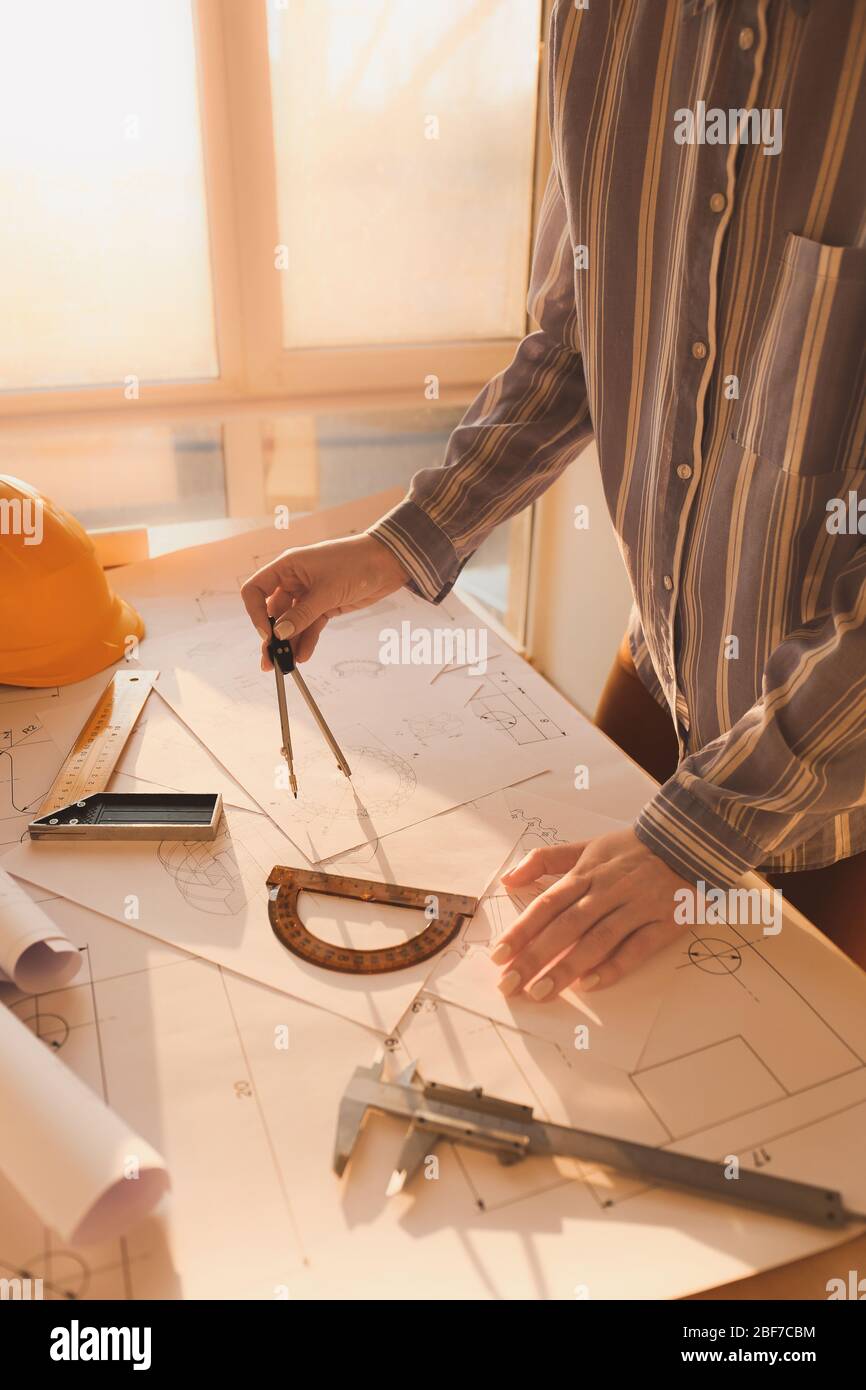 Female architect working in office Stock Photo - Alamy