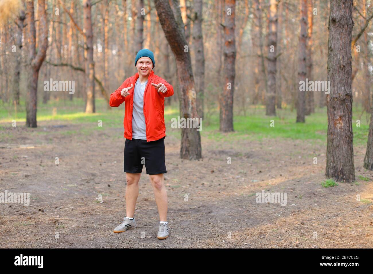 Young boy running in park at morning Stock Photo - Alamy