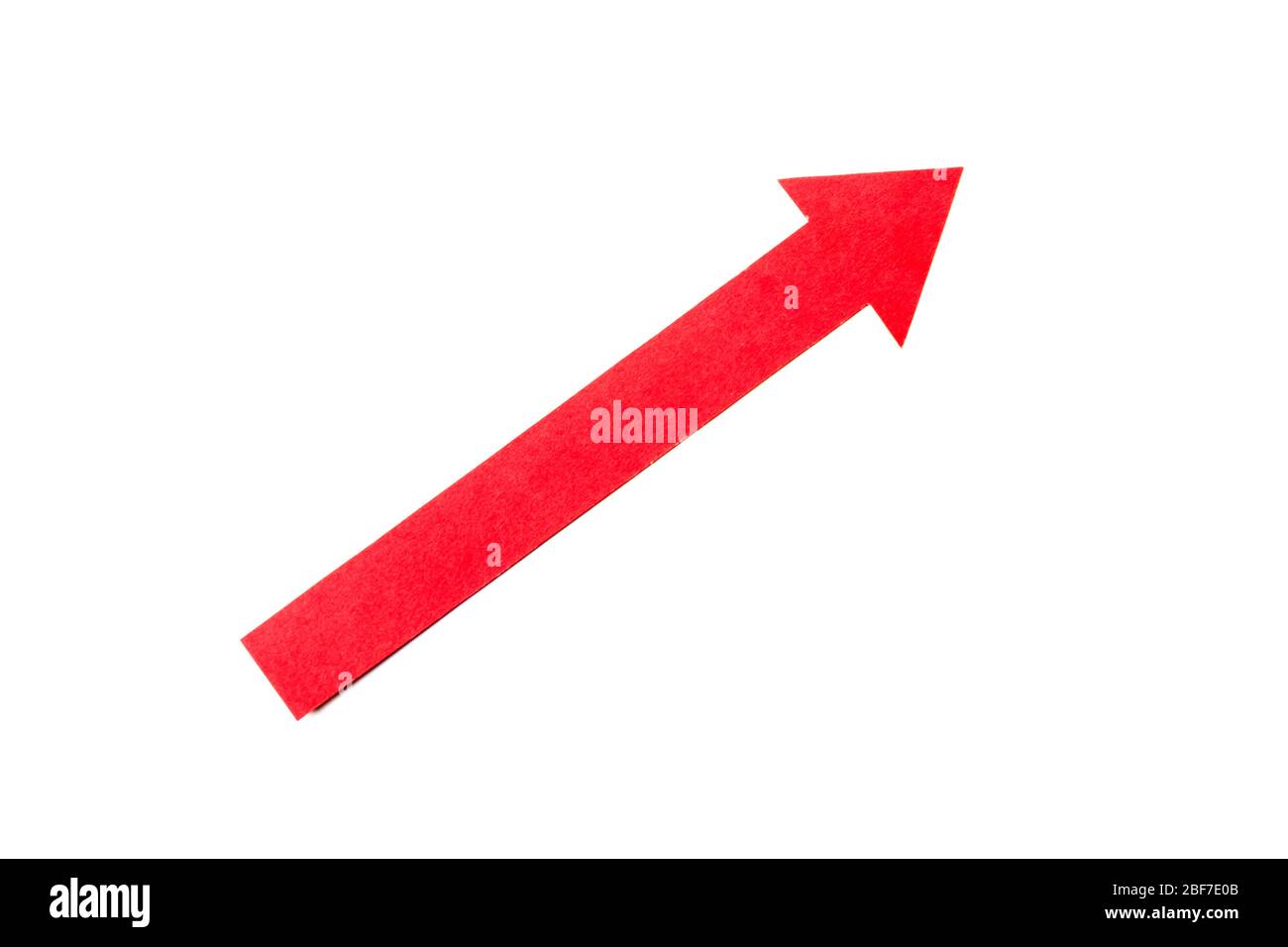Red arrow cut out of paper on a white background. Moving up Stock Photo ...