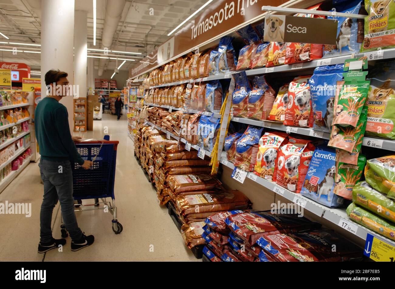 a customer going through an animal food section Stock Photo - Alamy