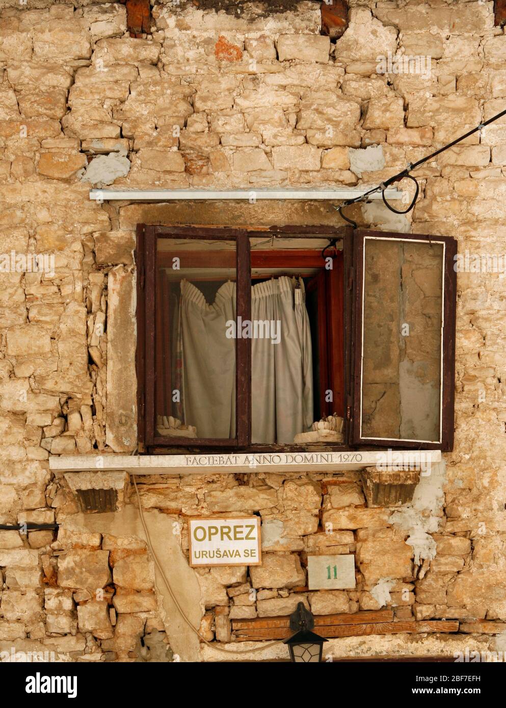 Typical window of an old town old house Stock Photo - Alamy