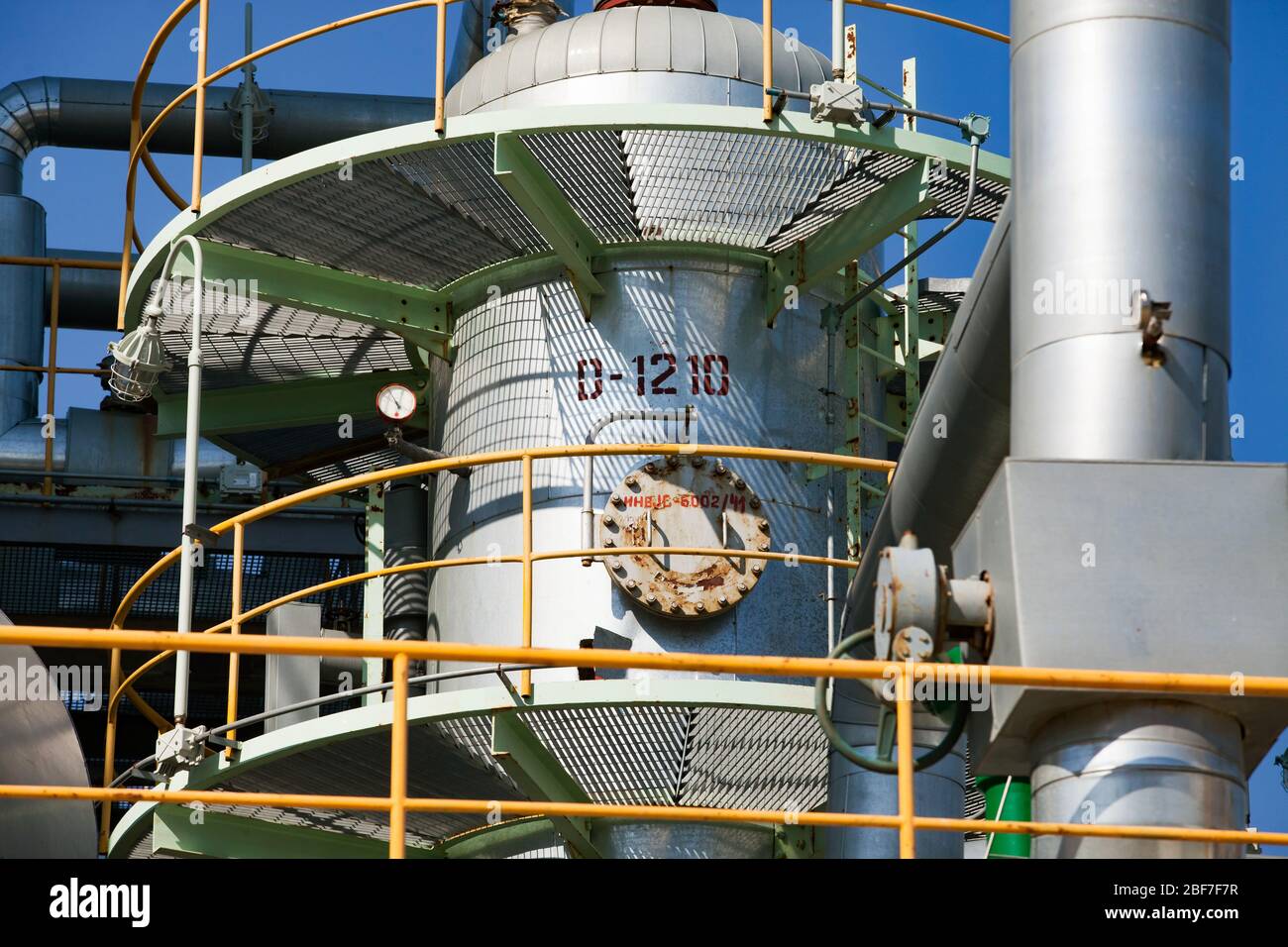 Petrochemical plant. Close-up of oil refinery column (distillation ...