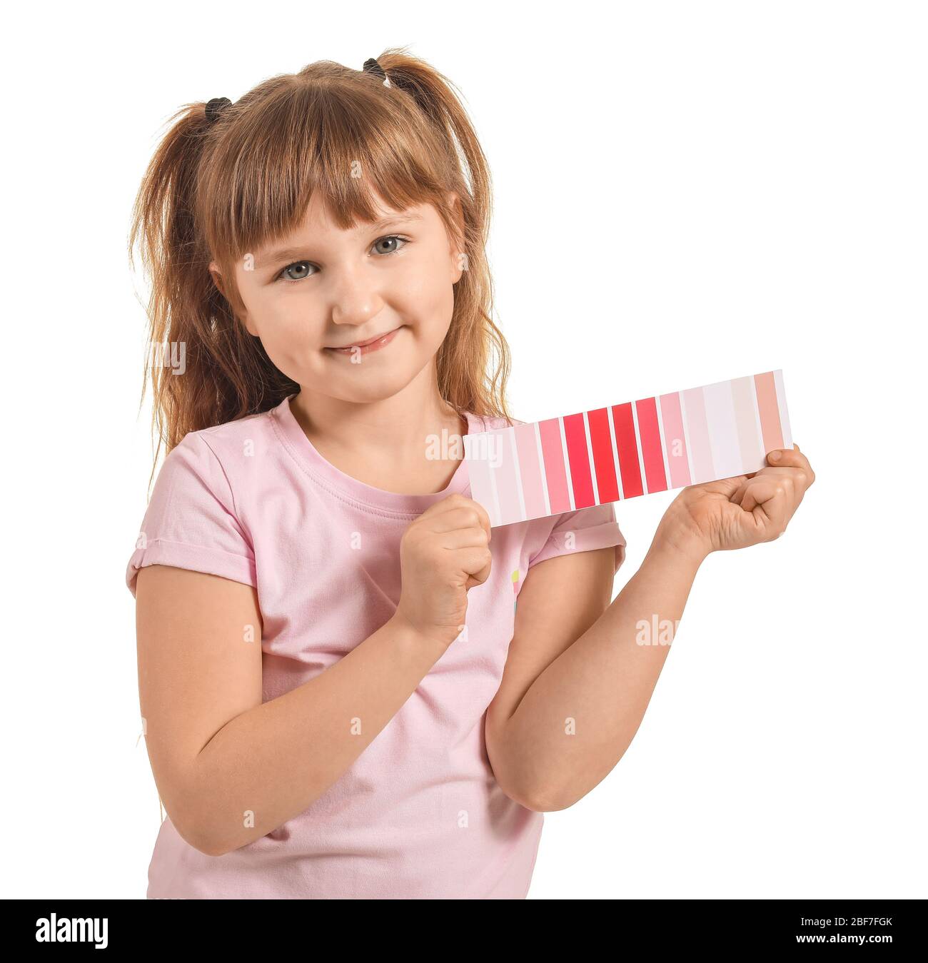 Little girl with color palette on white background Stock Photo - Alamy