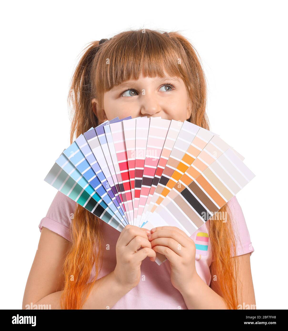 Little girl with color palettes on white background Stock Photo - Alamy