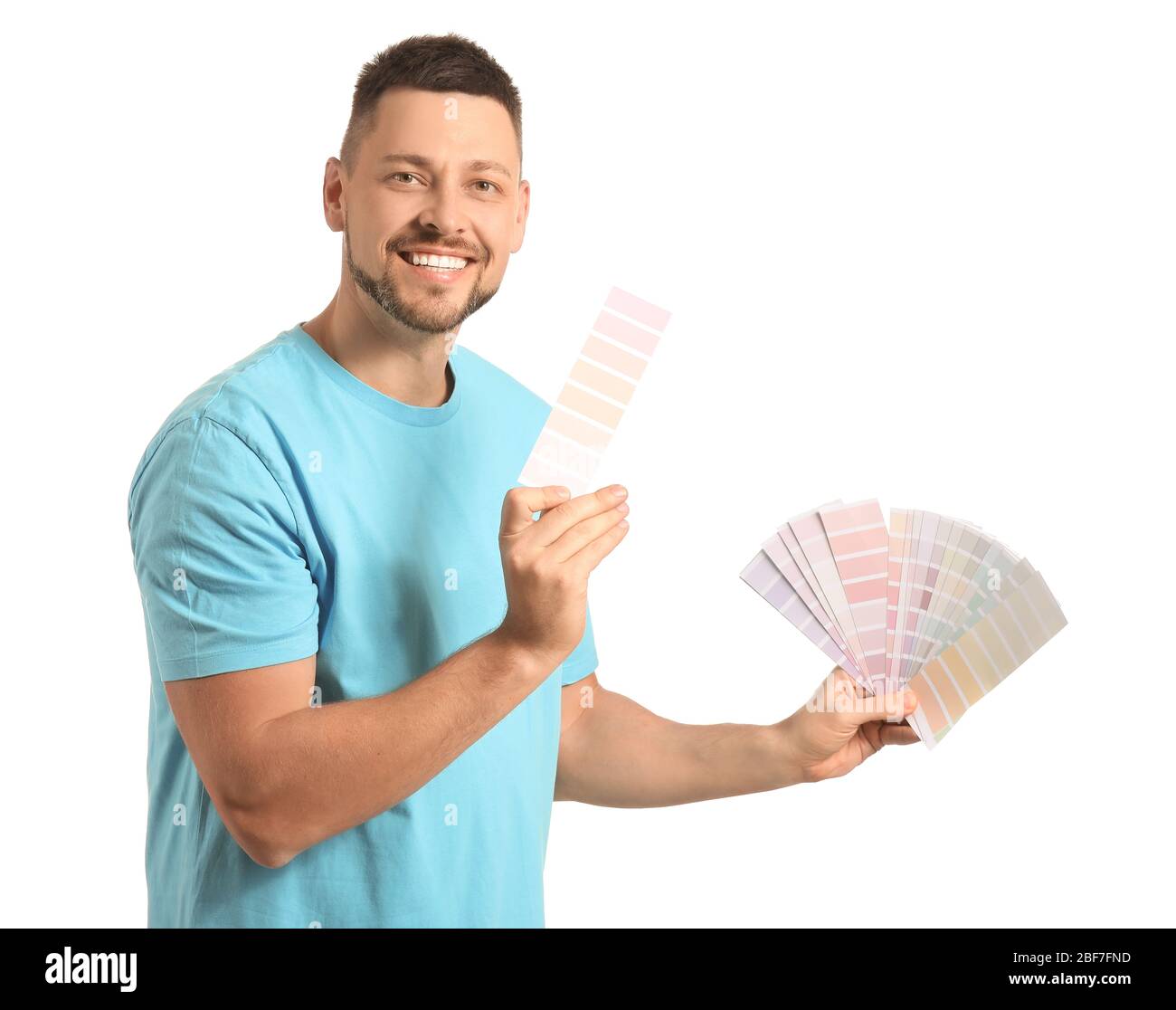 Man with color palettes on white background Stock Photo - Alamy