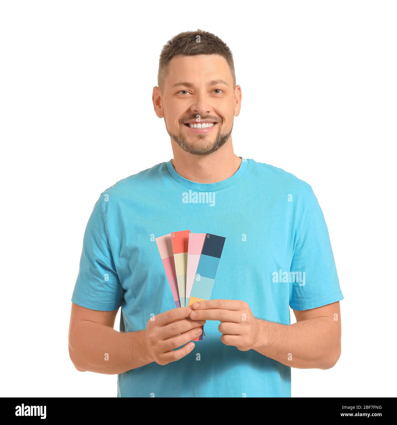 Man with color palettes on white background Stock Photo - Alamy