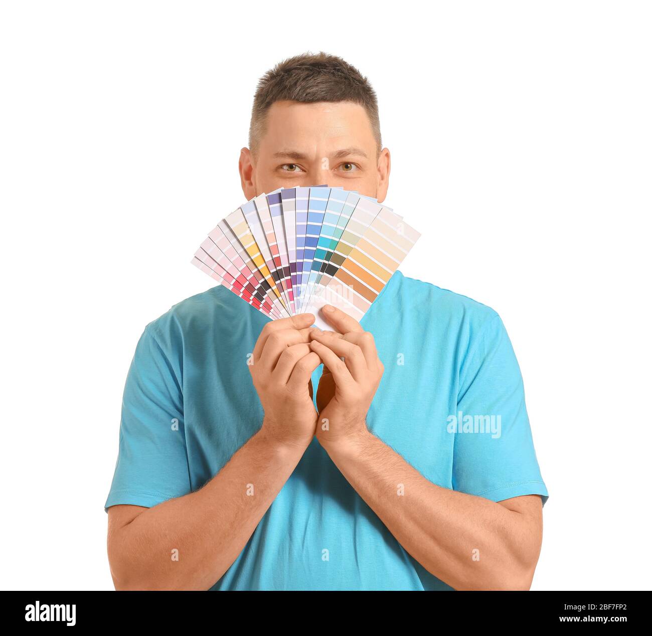 Man with color palettes on white background Stock Photo - Alamy