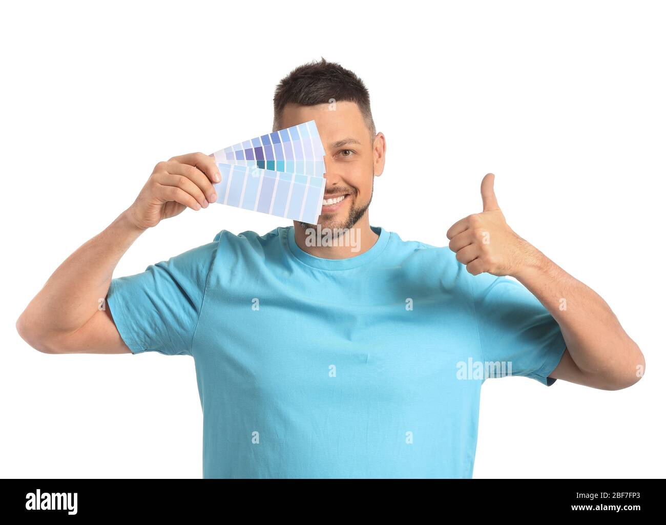 Man with color palettes on white background Stock Photo - Alamy