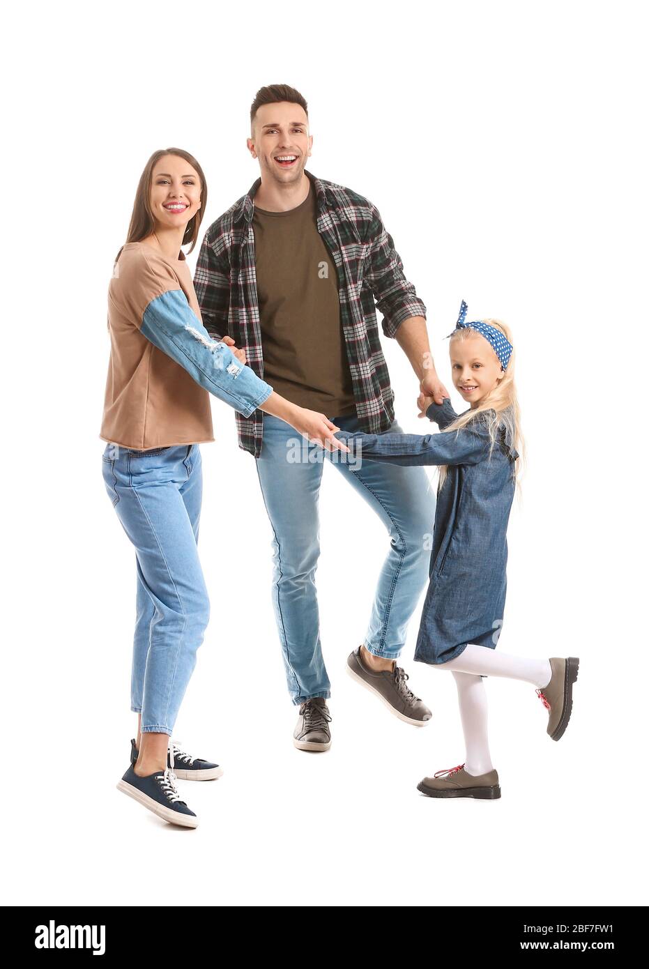 Happy dancing family on white background Stock Photo - Alamy