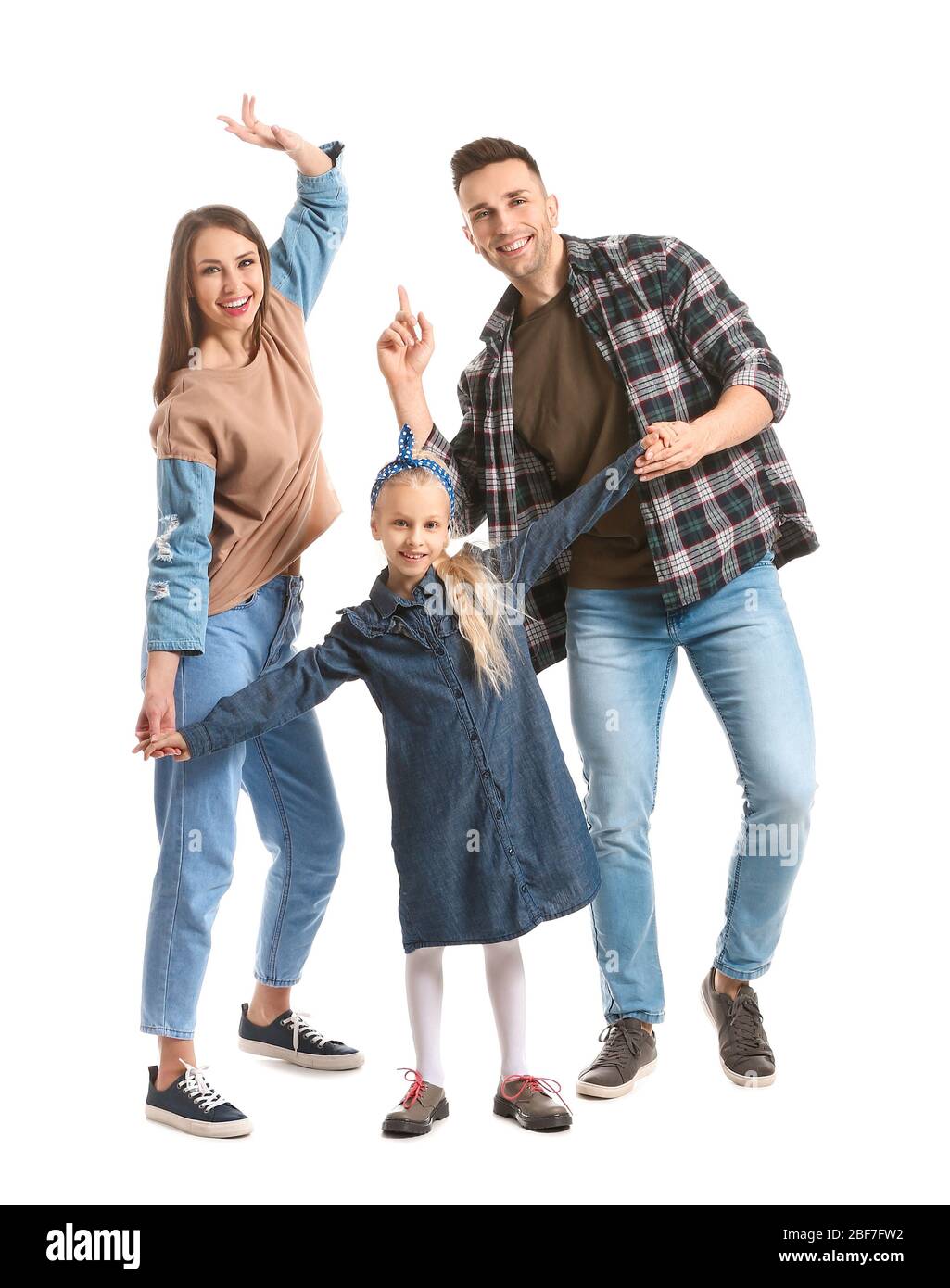 Happy dancing family on white background Stock Photo - Alamy