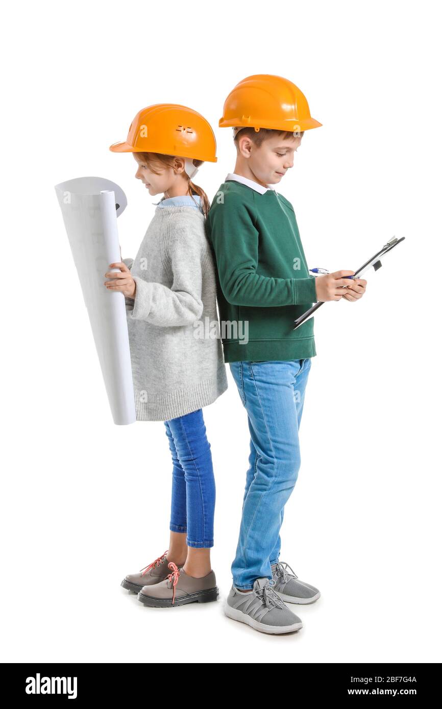 Cute little architects on white background Stock Photo - Alamy