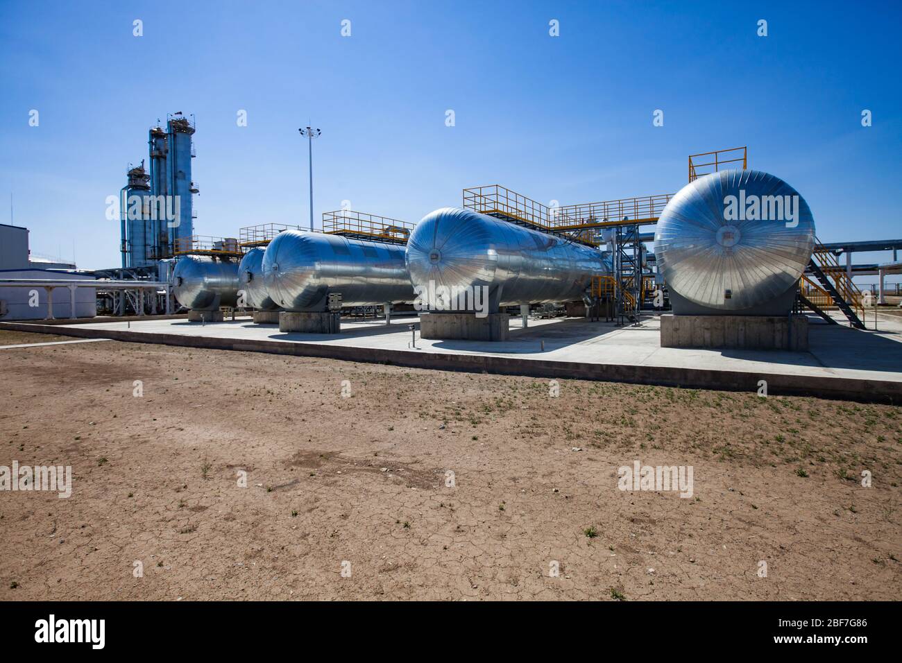 Oil refinery and gas processing plant in desert. A few heat exchangers ...