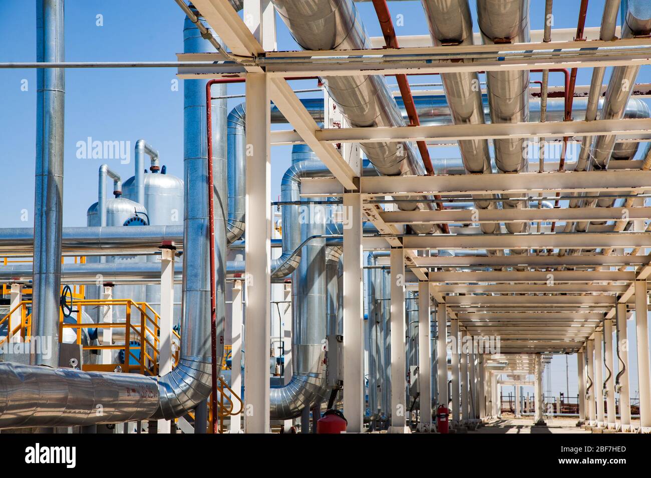 Petrochemical plant. Oil refinery plant. Abstract view of pipelines and ...
