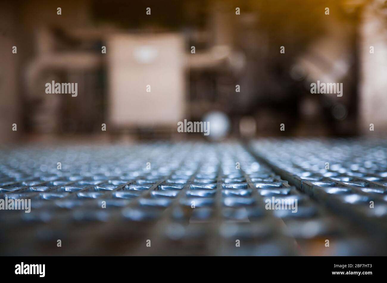 Abstract industrial background. A grid floor in factory warehouse ...