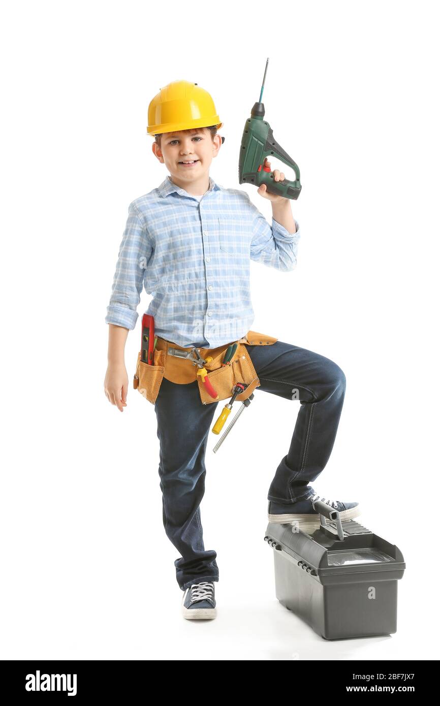 Cute little builder on white background Stock Photo - Alamy