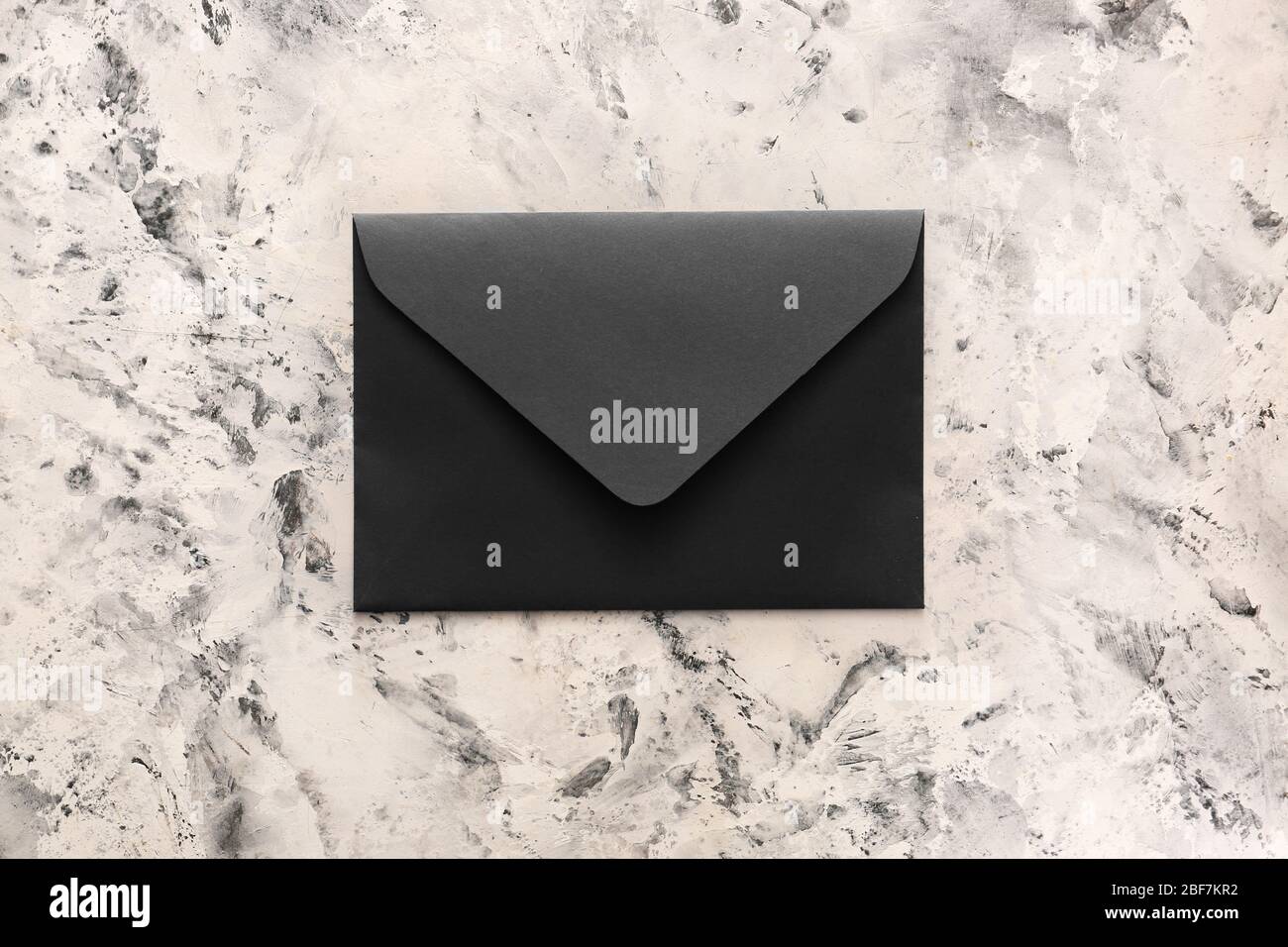 Paper envelope on grunge background Stock Photo - Alamy