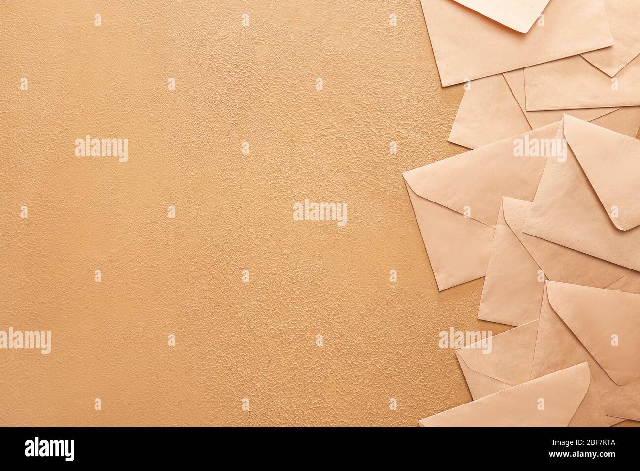 Paper envelopes on color background Stock Photo - Alamy
