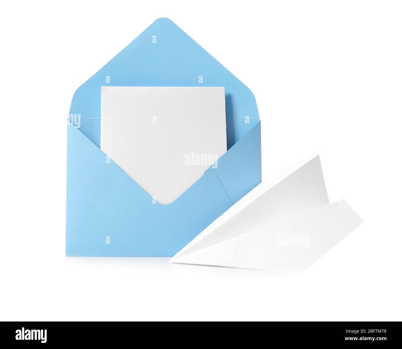 Envelope with card and paper airplane on white background Stock Photo ...
