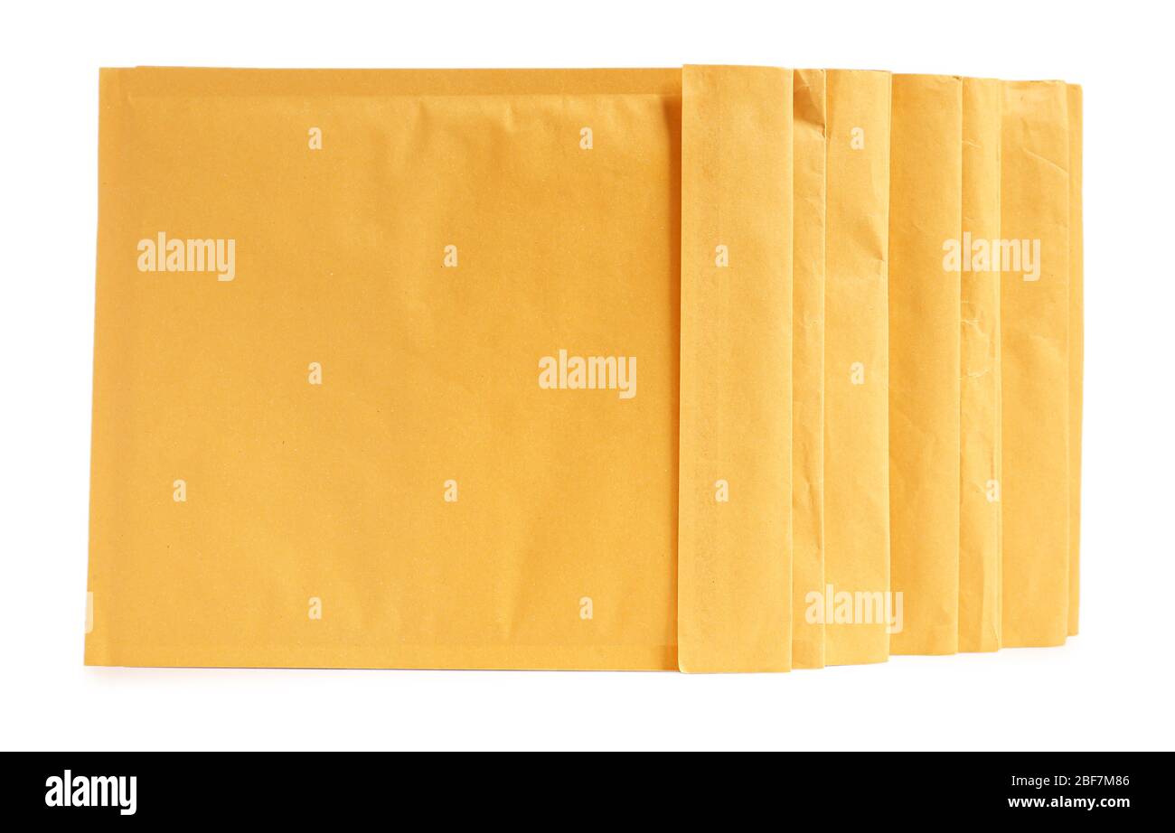 Many envelopes parcels on white background Stock Photo - Alamy