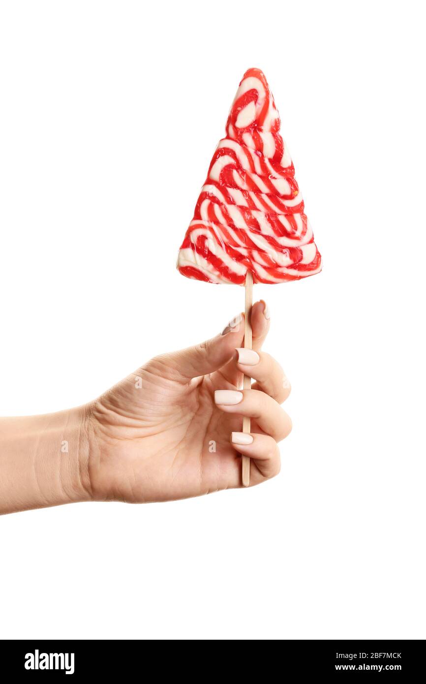 Hand holding sweets Cut Out Stock Images & Pictures - Alamy