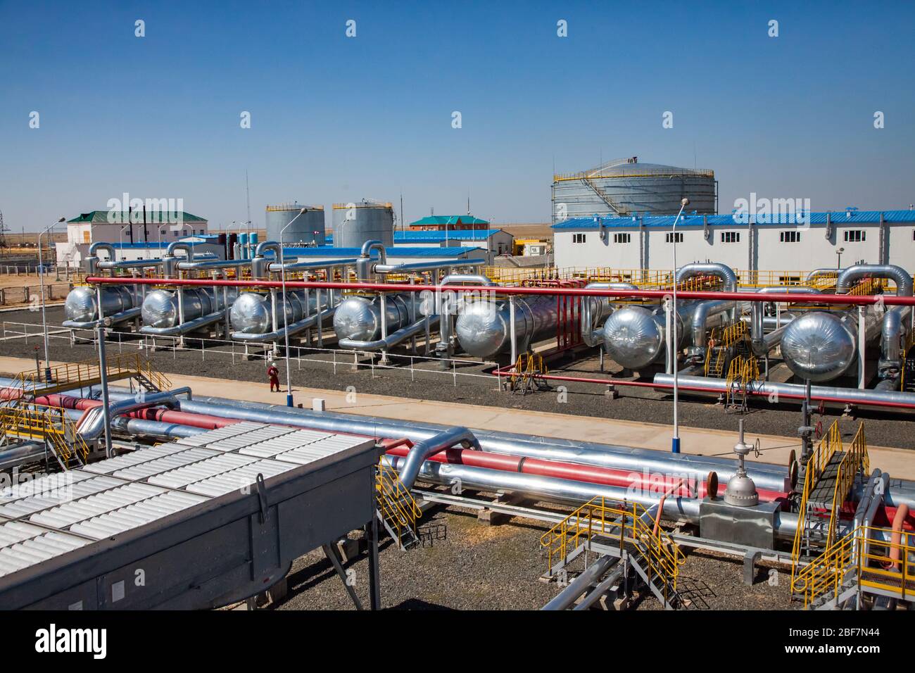 Petrochemical plant. Panorama of oil refinery plant in desert. Heat ...