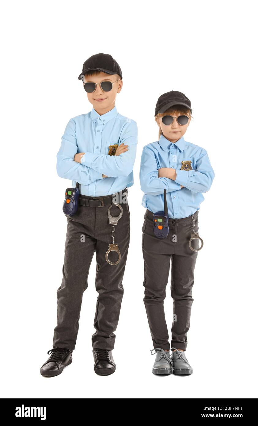 Cute little police officers on white background Stock Photo - Alamy