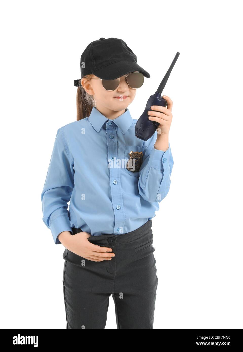 Cute little police officer on white background Stock Photo - Alamy