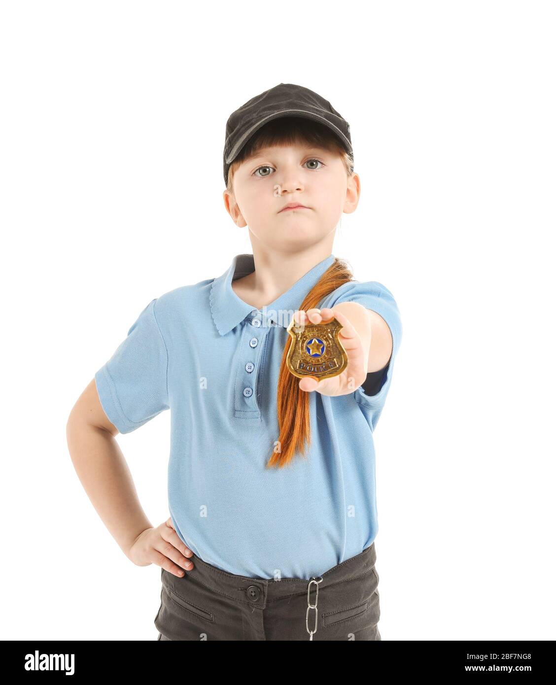 Cute little police officer on white background Stock Photo - Alamy