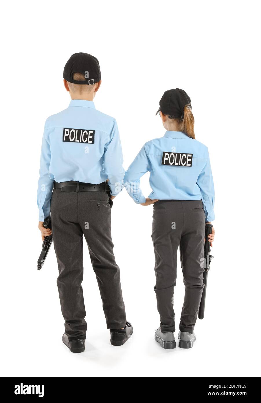 Cute little police officers on white background Stock Photo - Alamy