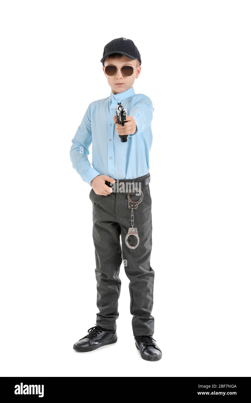 Cute little police officer on white background Stock Photo - Alamy
