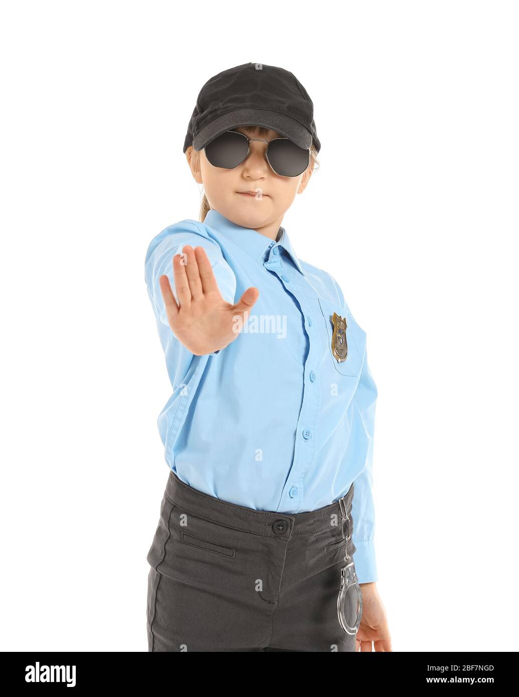 Cute little police officer on white background Stock Photo - Alamy