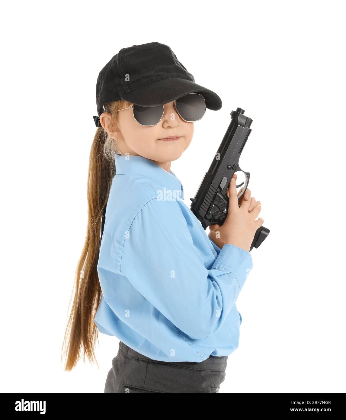 Cute little police officer on white background Stock Photo - Alamy