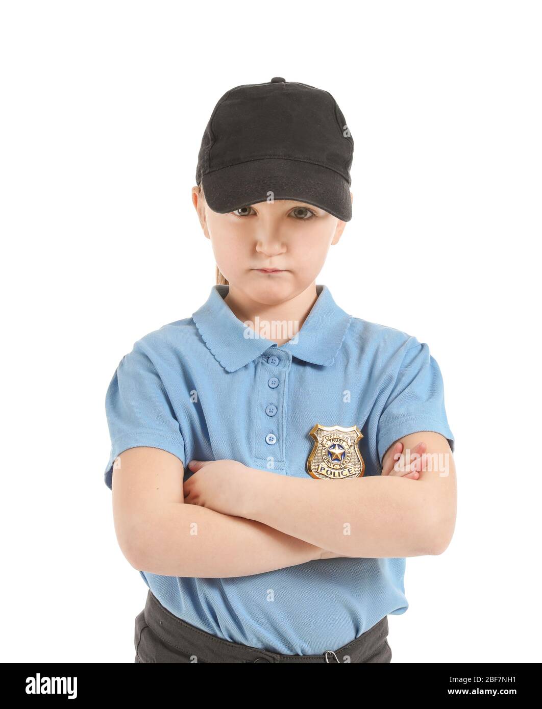 Cute little police officer on white background Stock Photo - Alamy