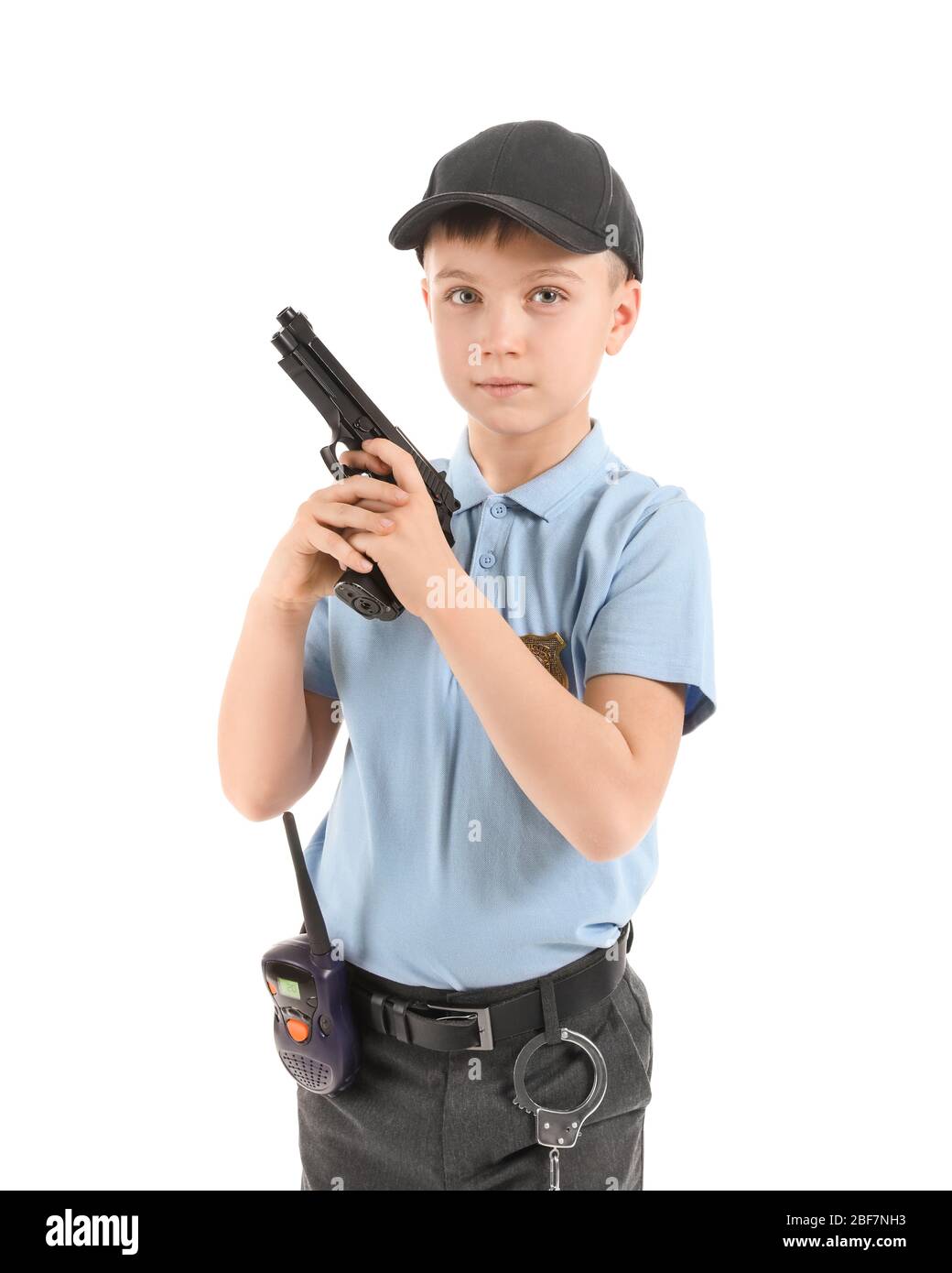 Cute little police officer on white background Stock Photo - Alamy